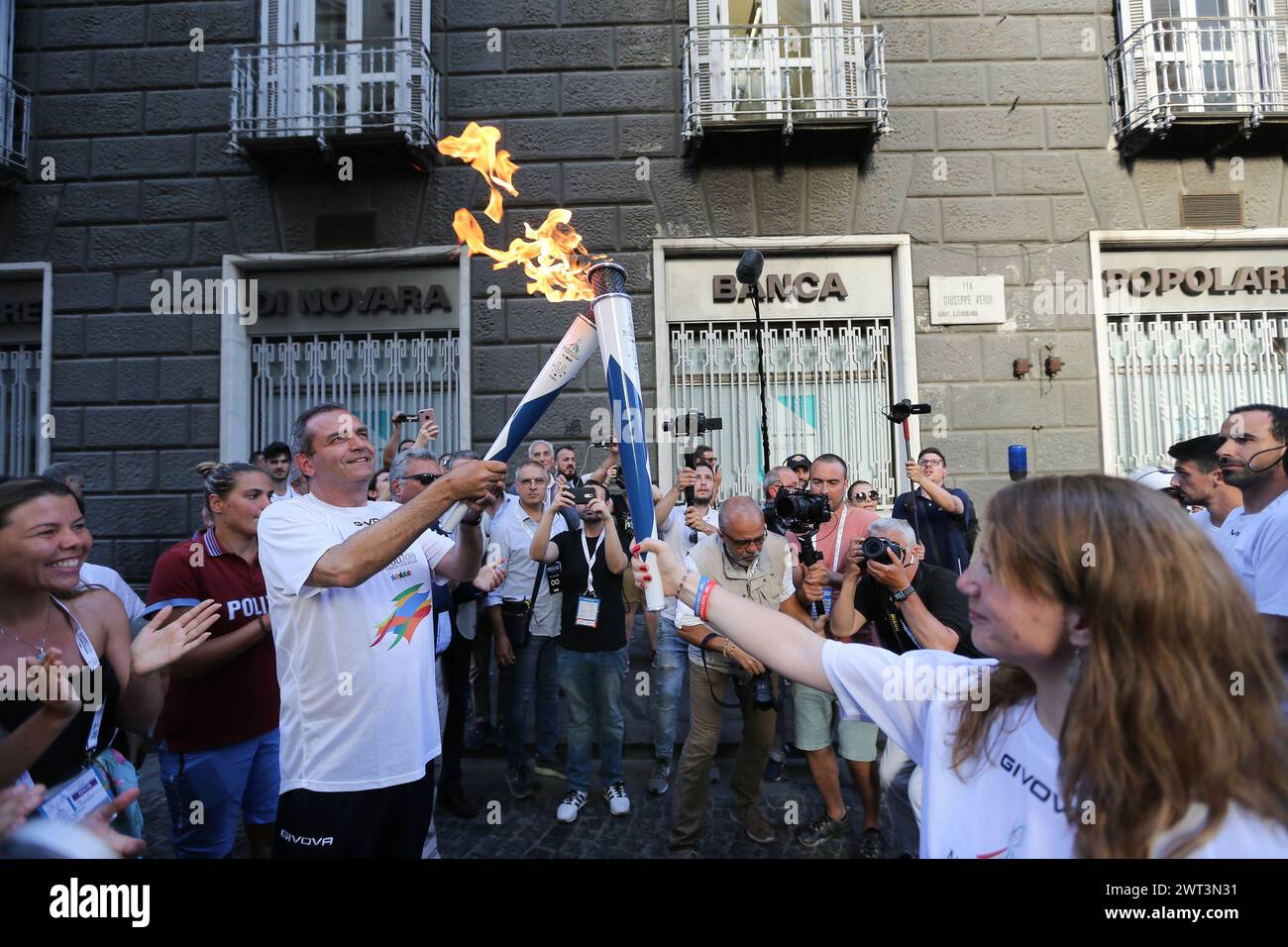 The mayor of Naples, Luigi de Magistris, lights the torch of the 2019 ...