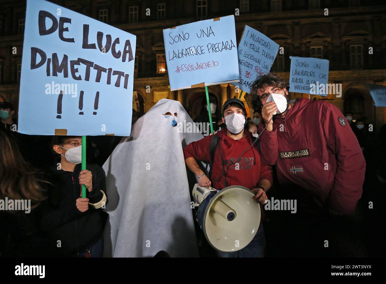 People with placards, and dressed as ghosts, protest against the ...
