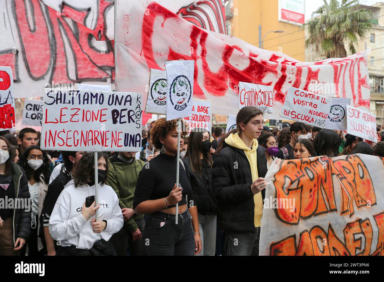 The protest march of students in Naples, with placards and banners ...