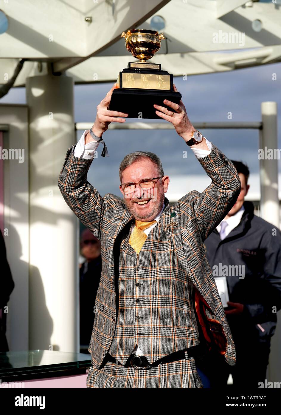 Greg Turley husband of owner Audrey Turley celebrates with the trophy ...