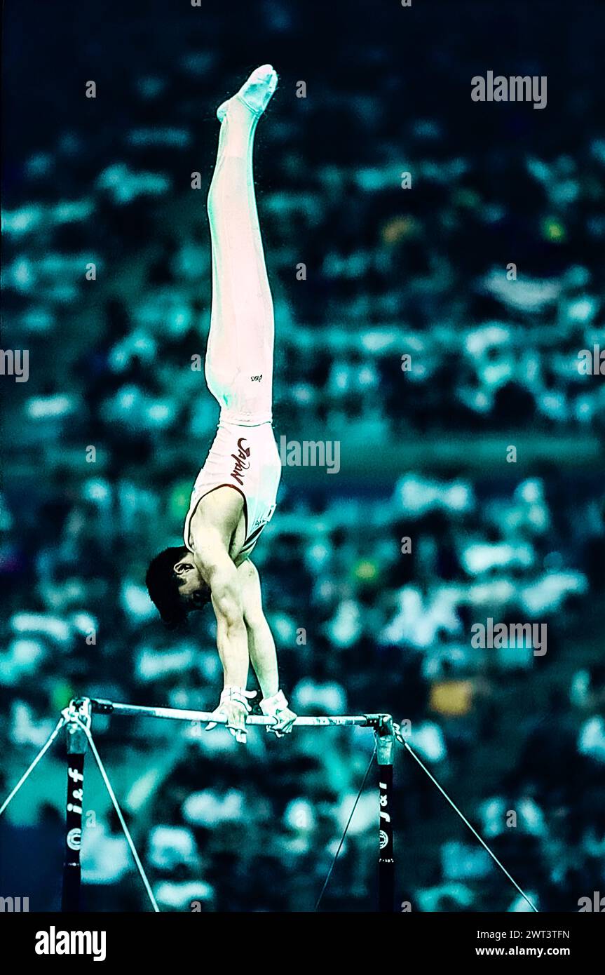 Japanese athlete competing in the men's artistic team all-around ...