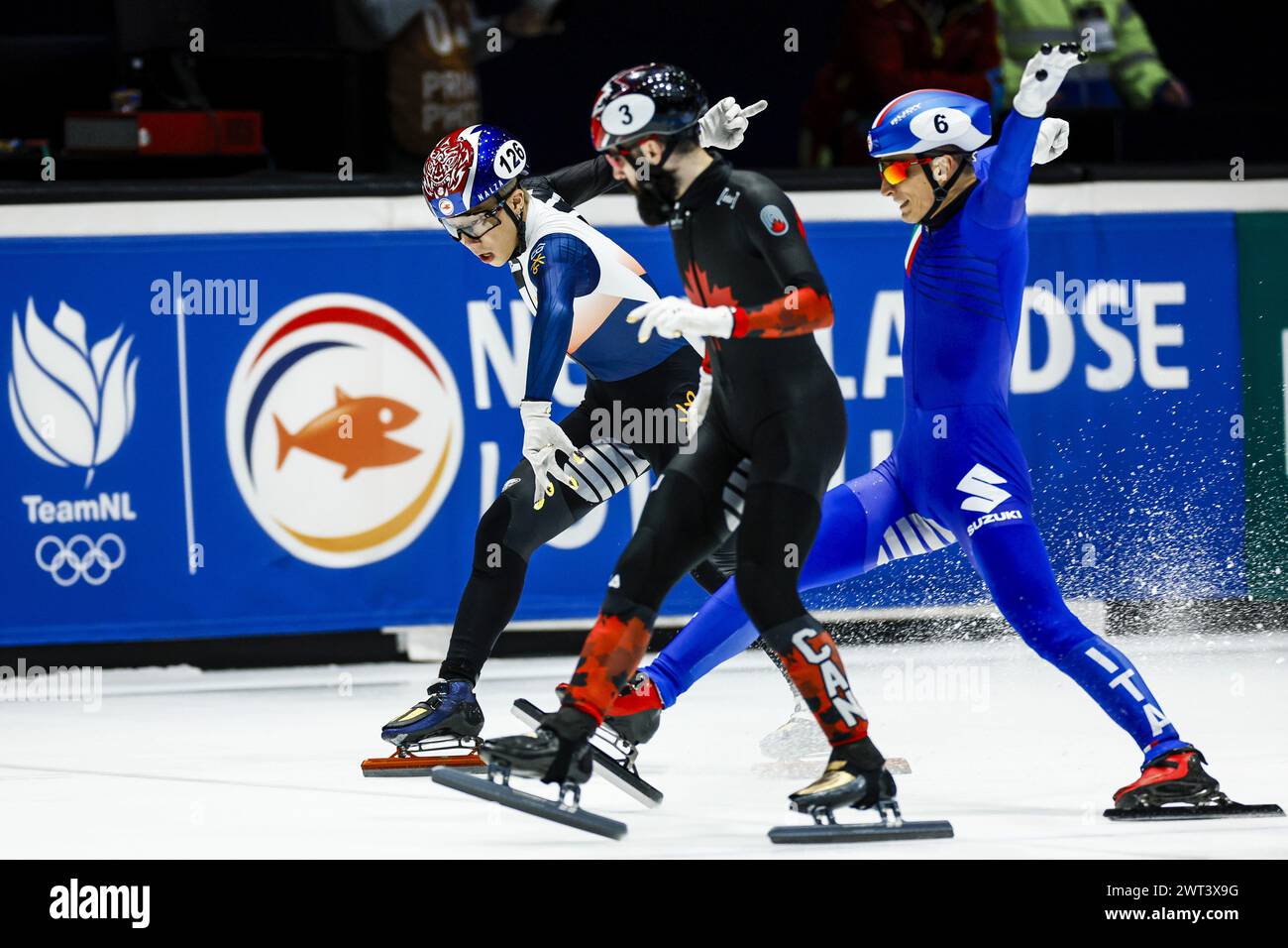 ROTTERDAM - (l-r) Gun Woo Kim (KOR), Steven Dubois (CAN), Pietro Sighel ...