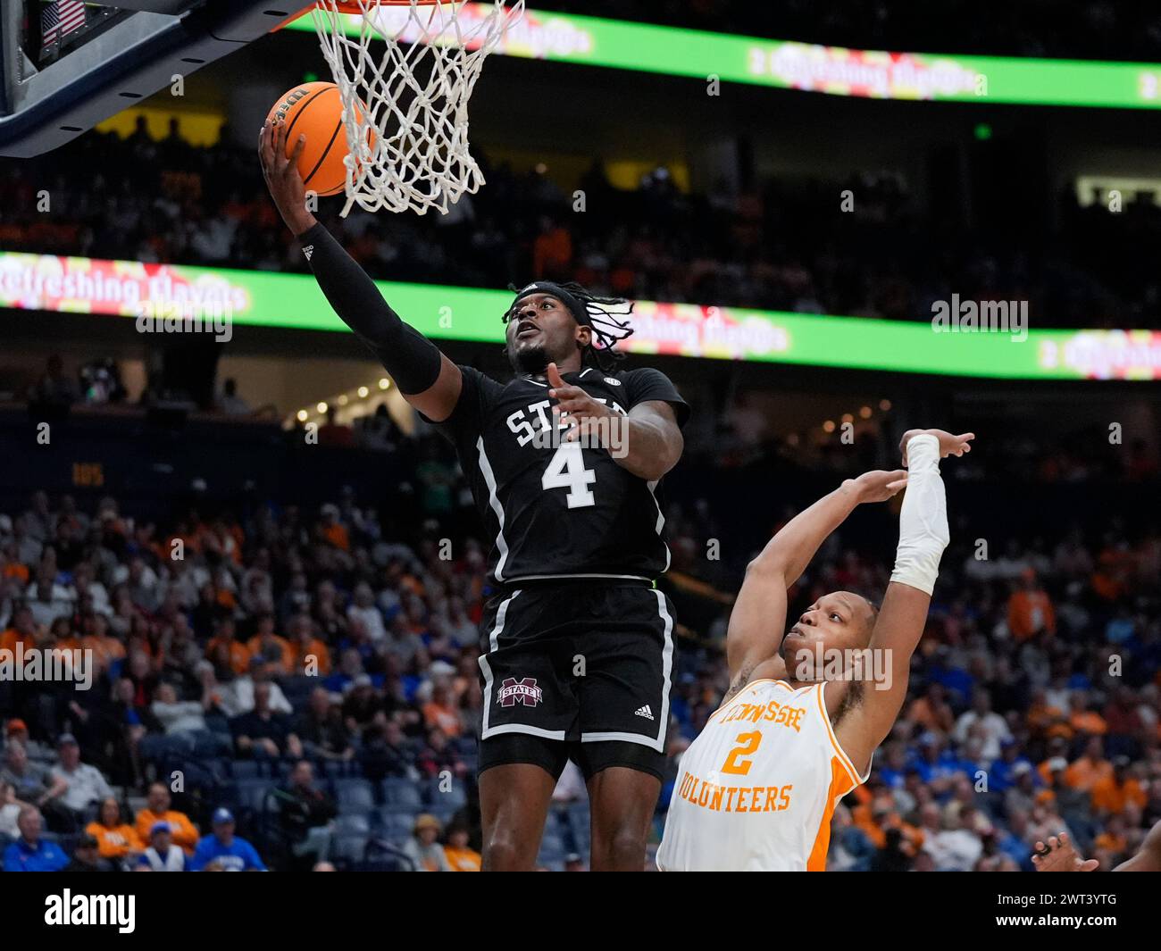 Mississippi State forward Cameron Matthews (4) scores as Tennessee ...