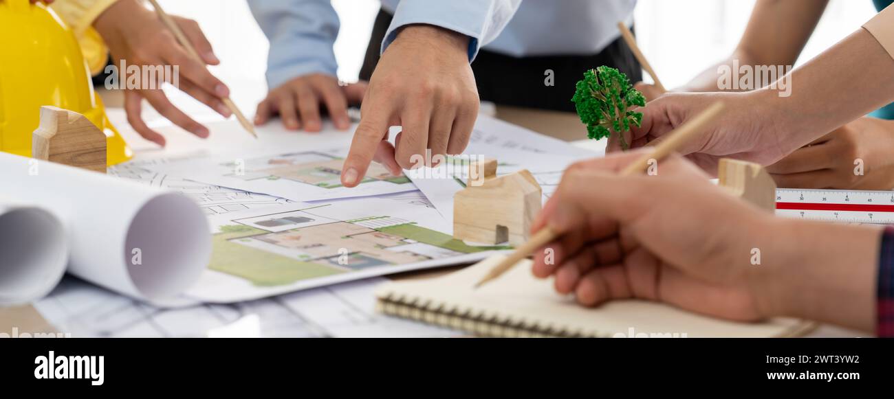 Professional architect cooperate with engineer discussing the use of ...