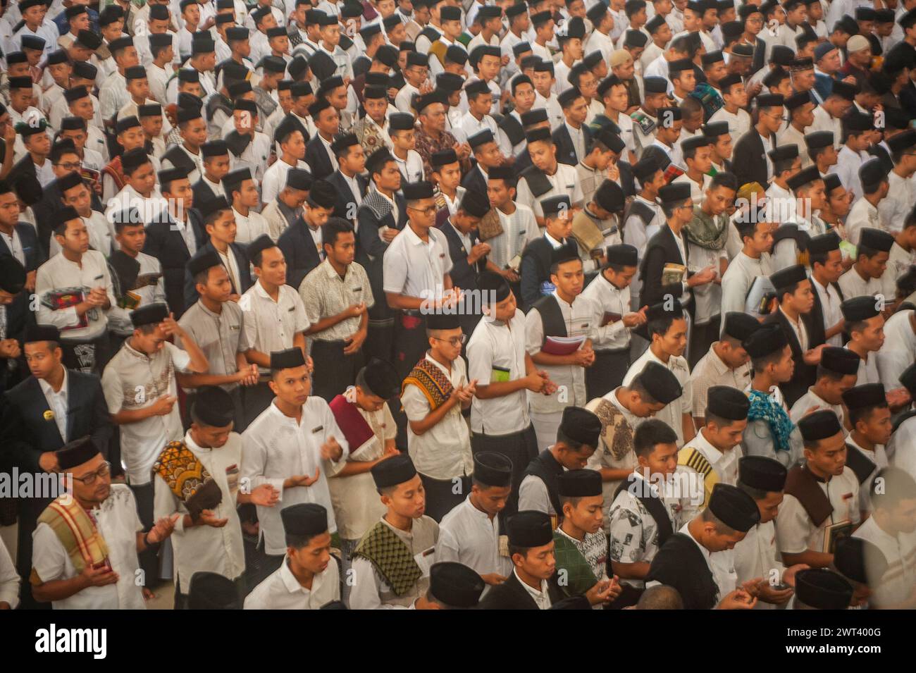 Muslim students are seen during the Muslim funeral prayer procession in ...