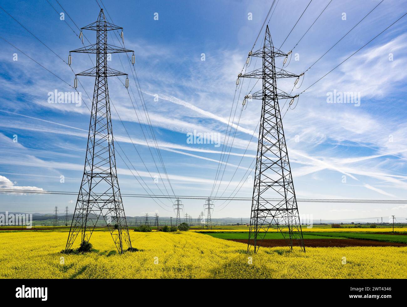 Transmission towers in Greece in Spring Stock Photo - Alamy