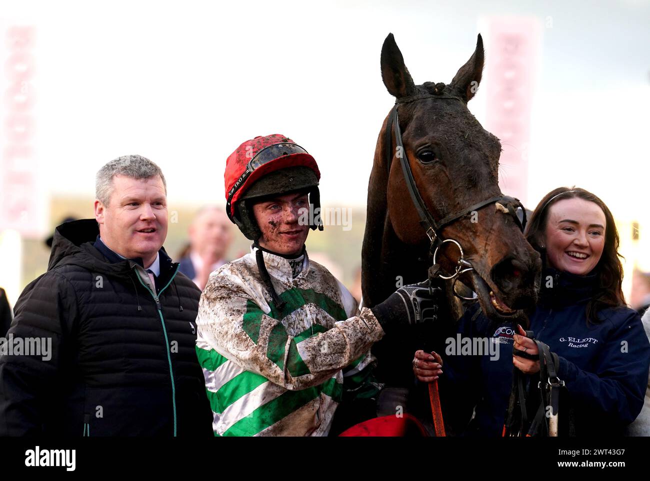 Jockey Danny Gilligan and trainer Gordon Elliott pose for a photo as they celebrate after Better ...