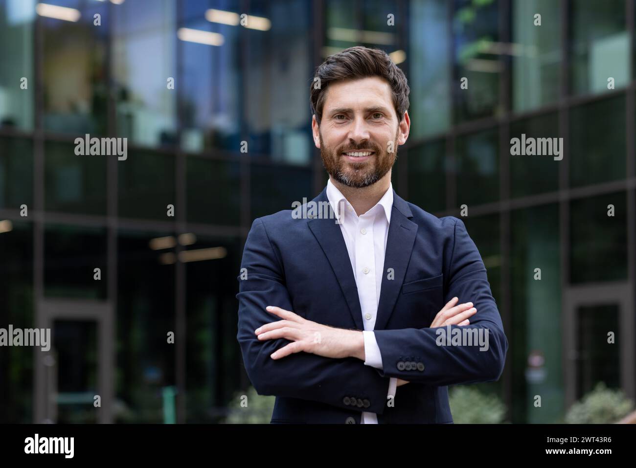 The portrait of a close successful young man of a businessman, the ...