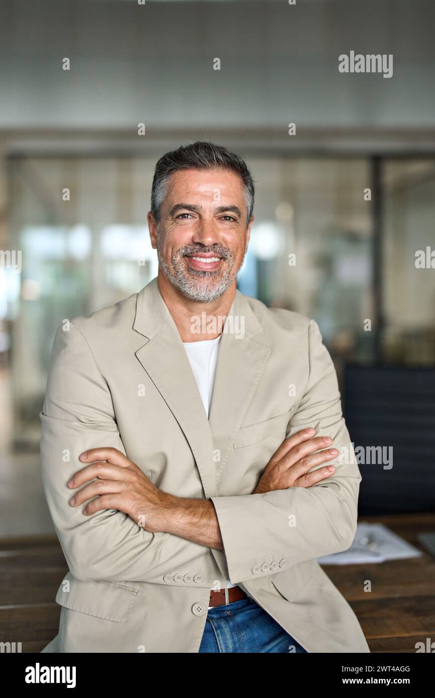 Confident mature business man ceo executive leader in office. Vertical portrait Stock Photo - Alamy
