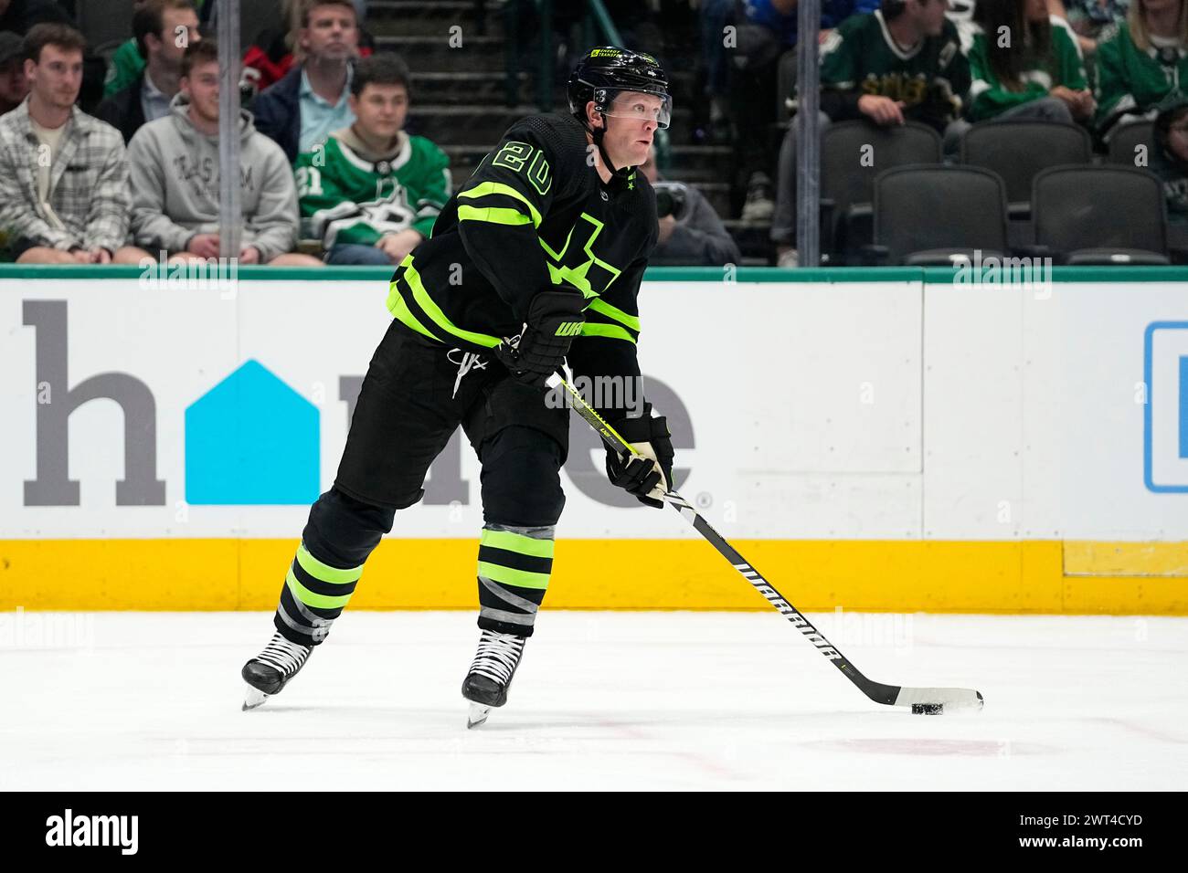 Dallas Stars' Ryan Suter handles the puck during an NHL hockey game ...