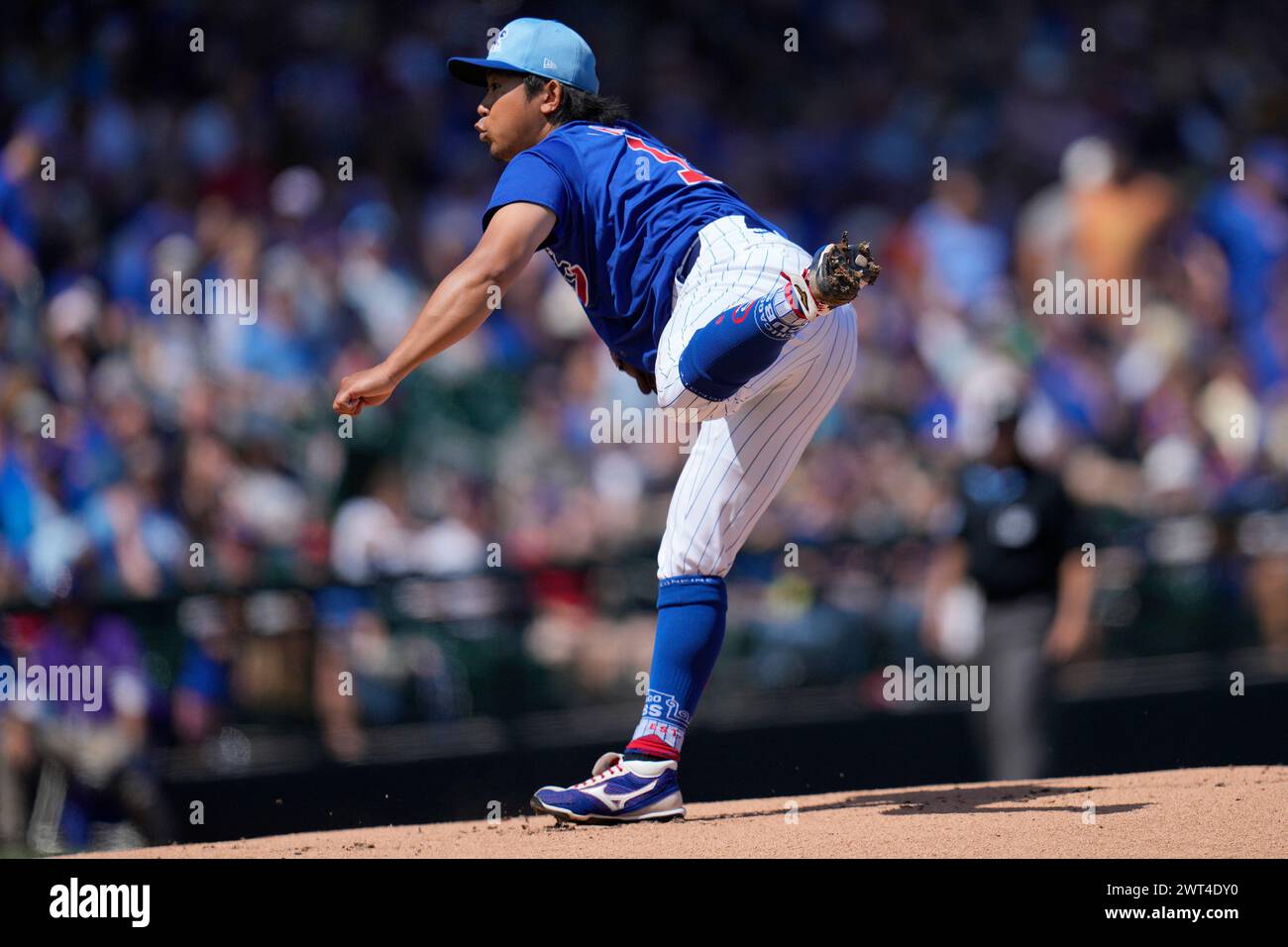 Chicago Cubs starting pitcher Shota Imanaga, of Japan, follows through ...