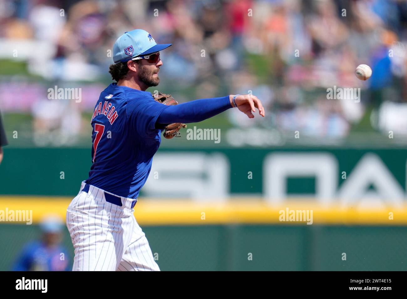 Chicago Cubs shortstop Dansby Swanson throws to first base after making ...