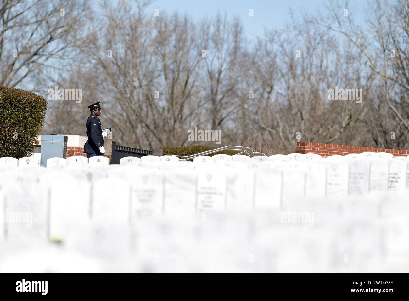 A poignant moment unfolds as a Soldier plays taps, honoring a fallen ...