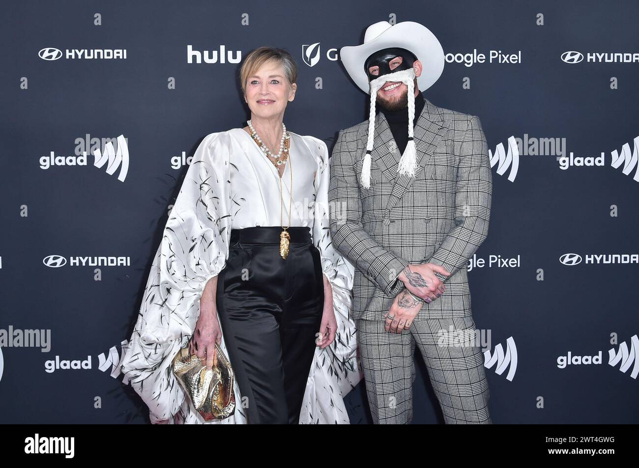 Sharon Stone, left, and Orville Peck attend the 35th annual GLAAD Media ...