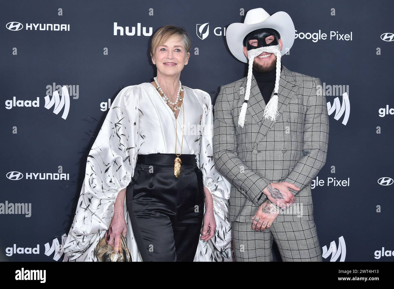 Sharon Stone, left, and Orville Peck attend the 35th annual GLAAD Media ...
