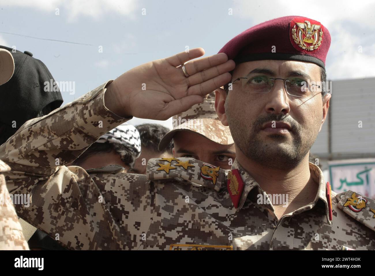 Houthi supporters hold a palestinian flag hi-res stock photography and ...