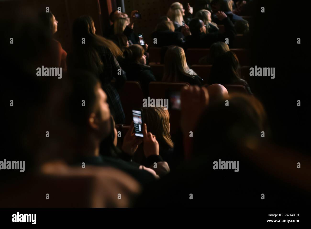 Person in focus in blurred crowd hi-res stock photography and images ...