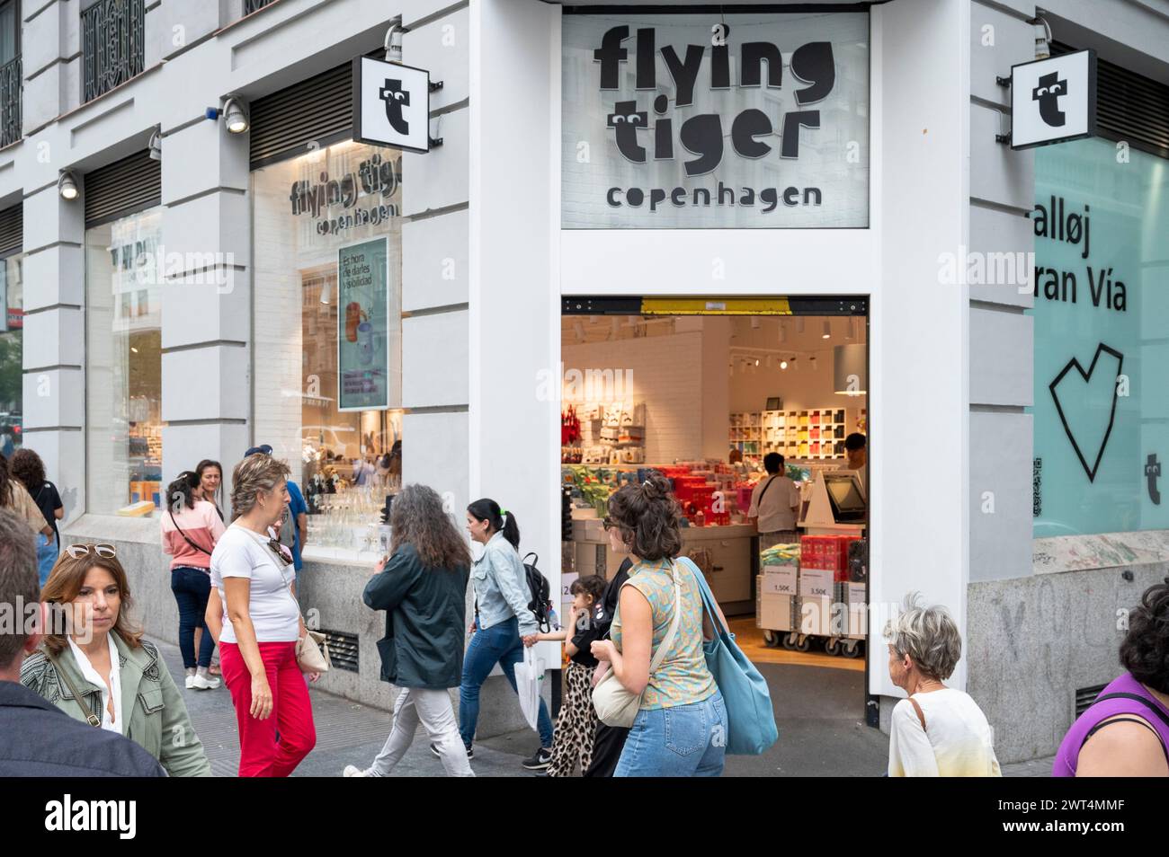 Pedestrians and shoppers walk past the Danish gift chain, Flying Tiger ...