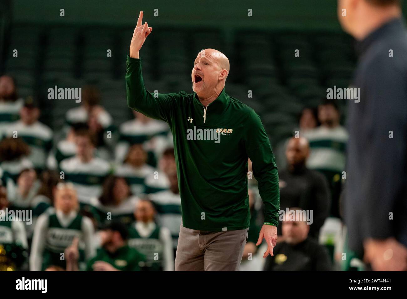 FORT WORTH, TX - MARCH 15: UAB Blazers head coach Andy Kennedy holds up ...