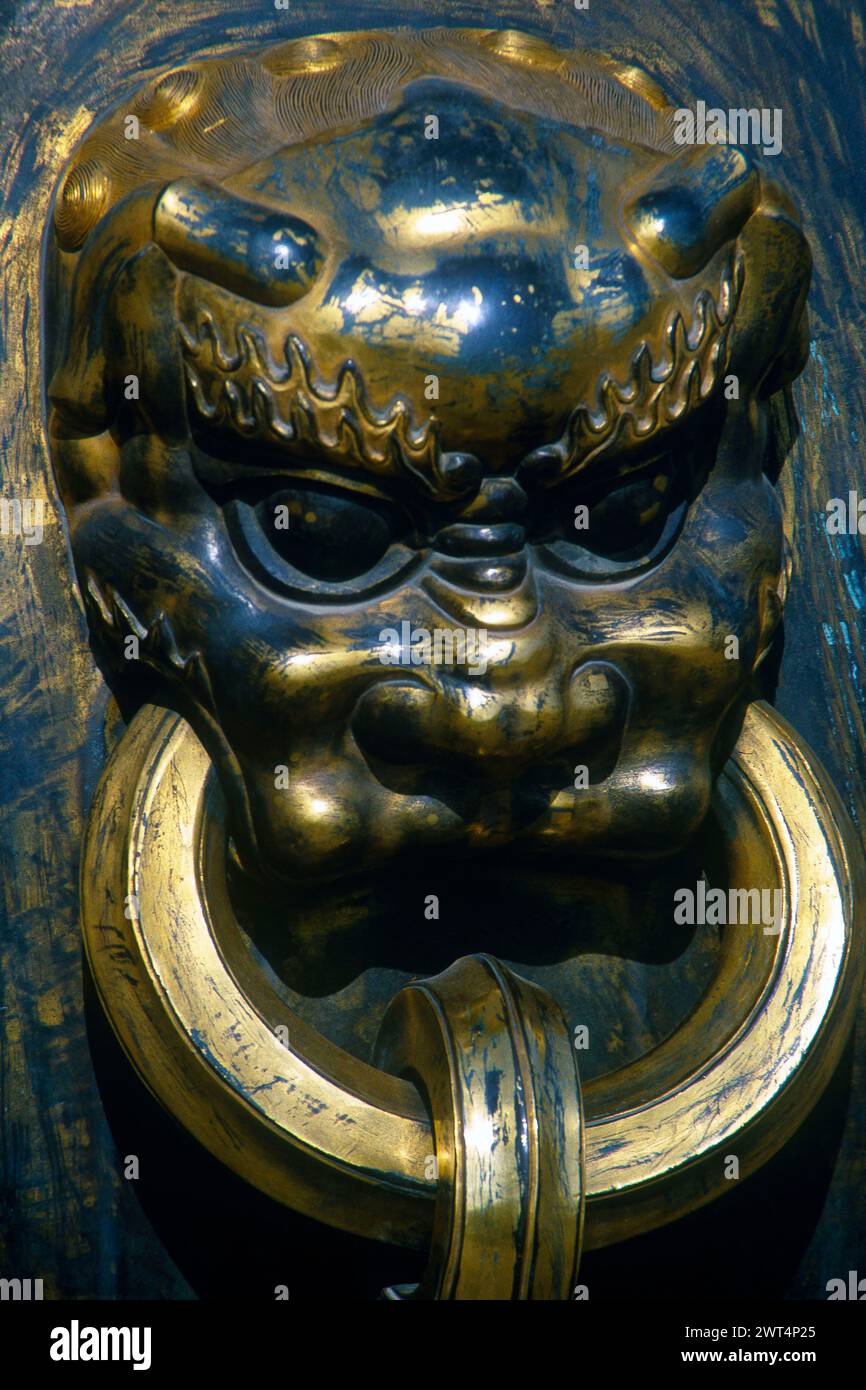 A gold symbolic cistern with ornate handles, Hall of Supreme Harmony ...