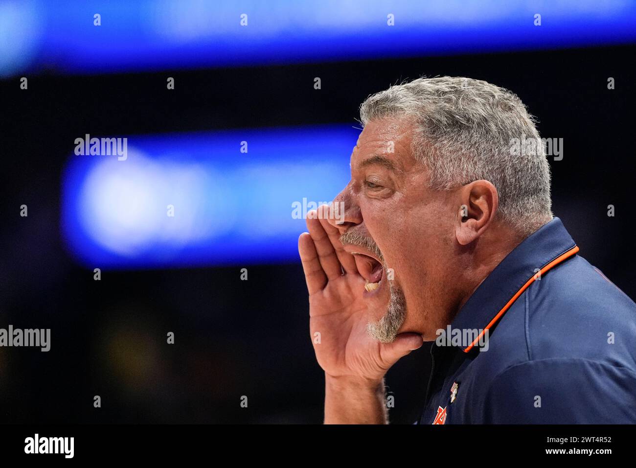 Auburn head coach Bruce Pearl yells to his players on the court during ...
