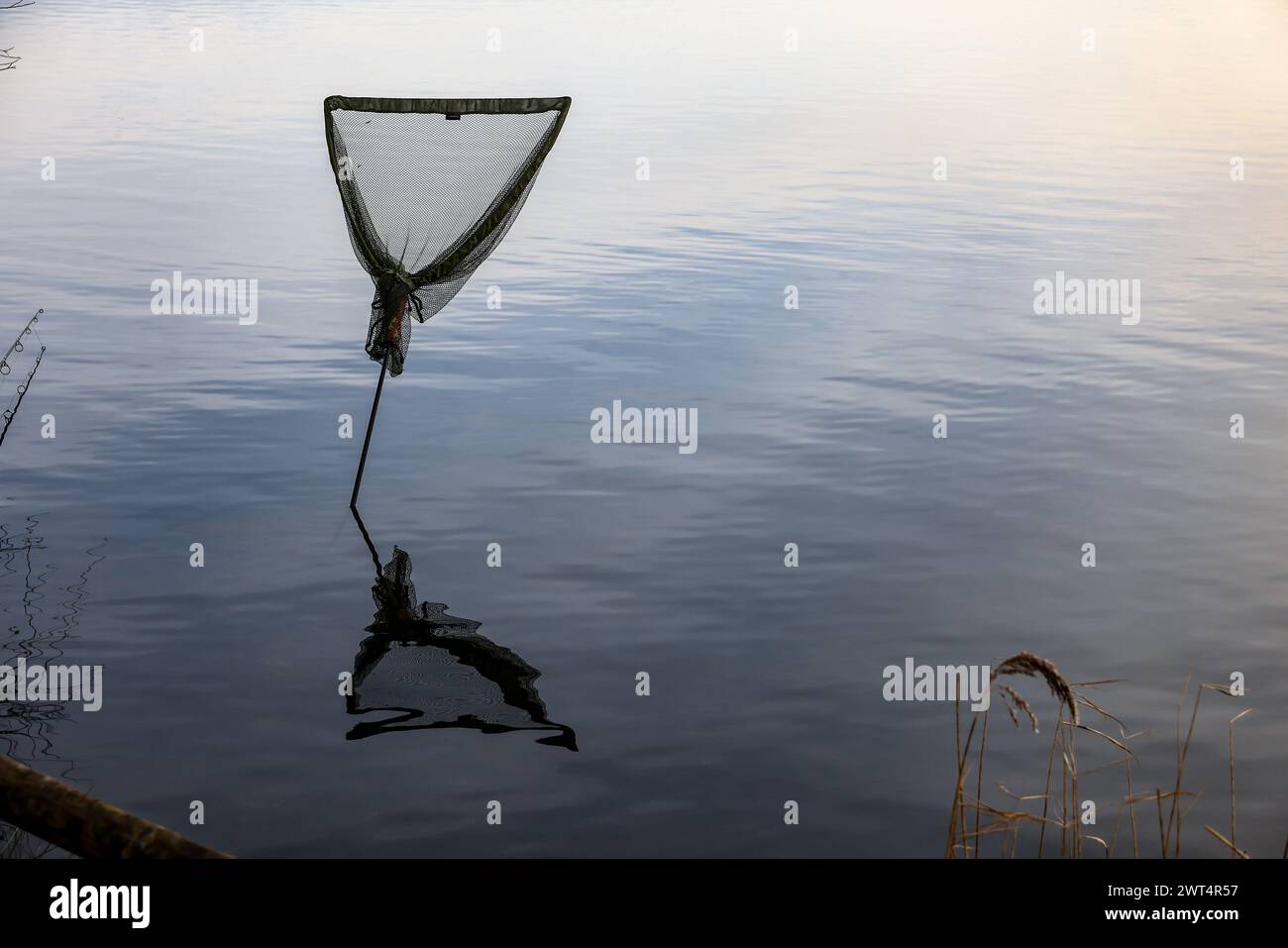 Hand fishing net mesh hi-res stock photography and images - Alamy