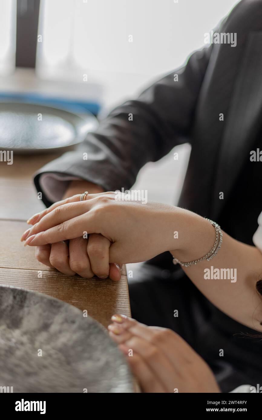 a Couple's hands express unity and affection elegantly Stock Photo - Alamy