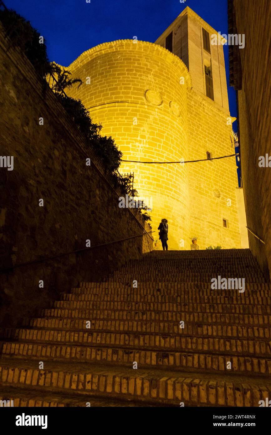 Steps through an arch leading up to the Castle. Iznajar, Andalucia ...