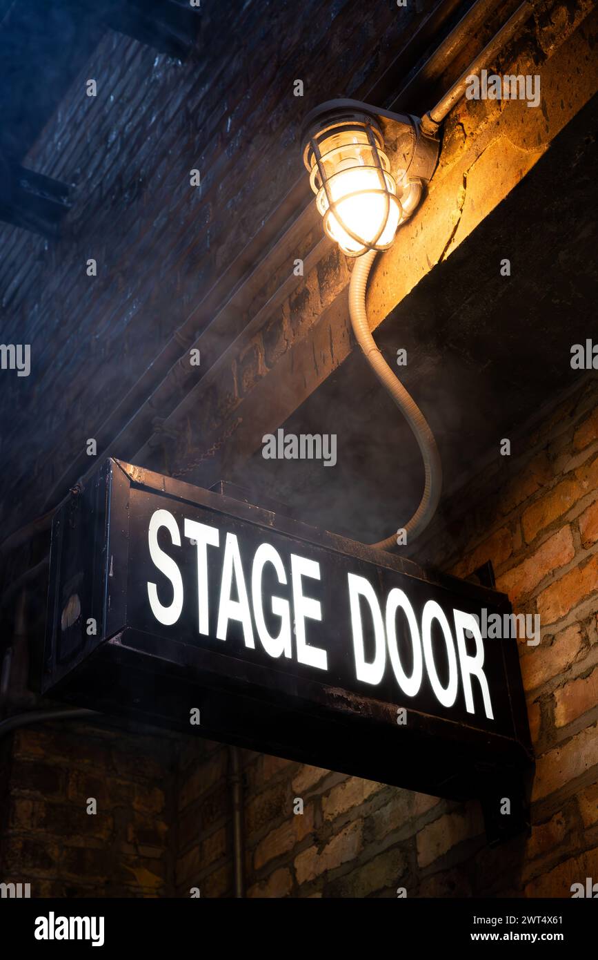 Stage door sign in downtown Chicago alley Stock Photo - Alamy