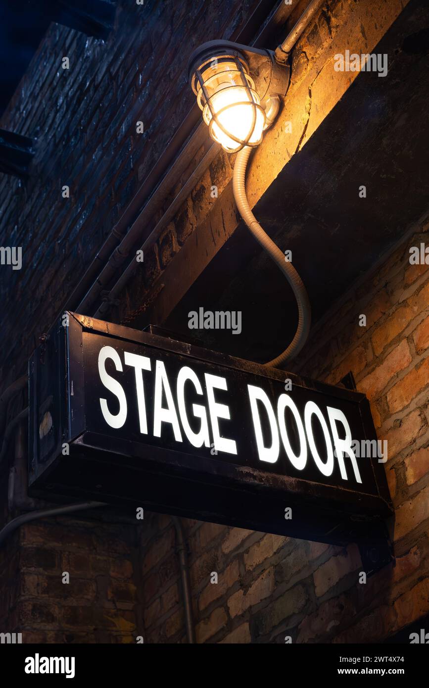 Stage door sign in downtown Chicago alley Stock Photo - Alamy