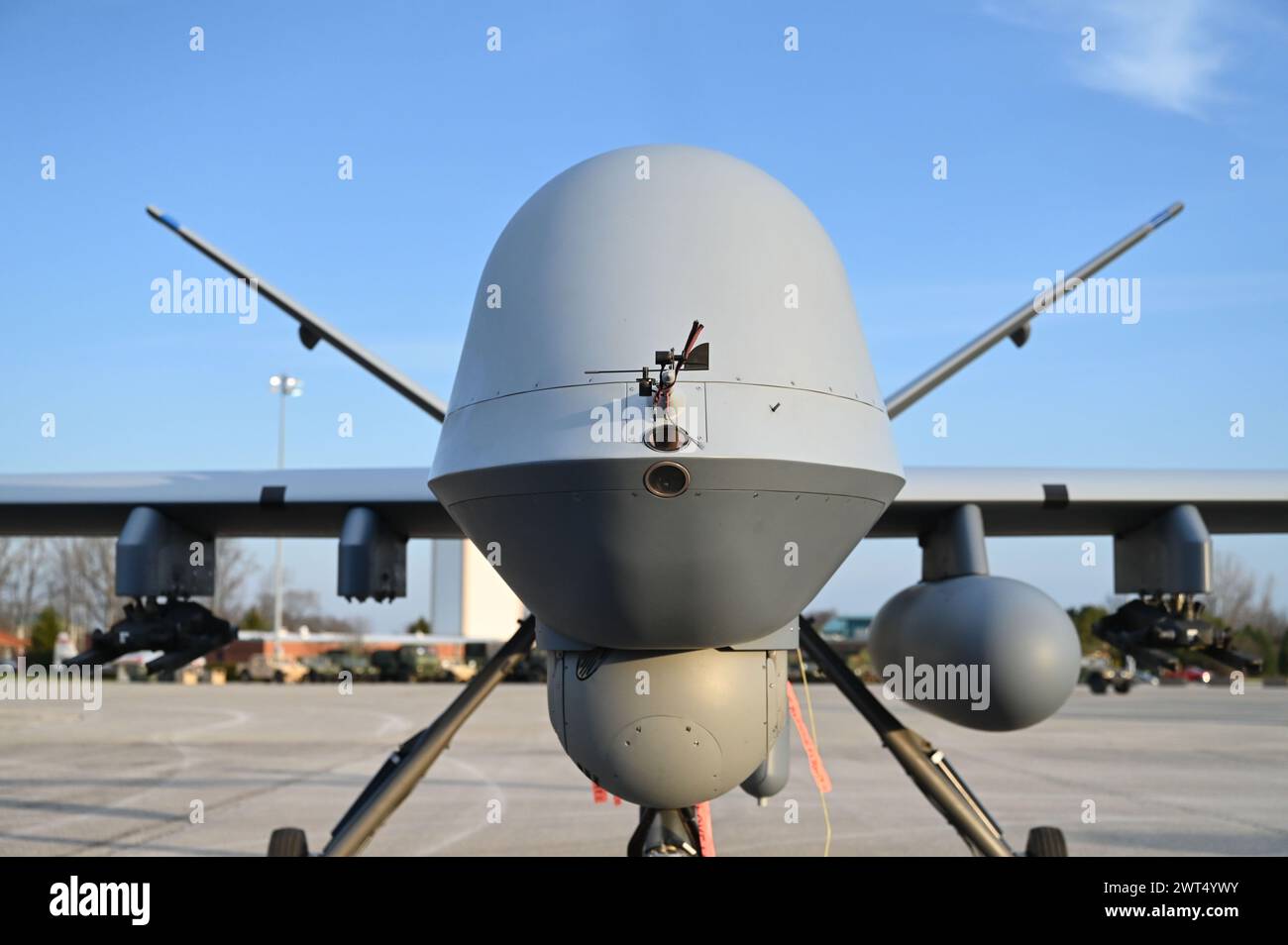 A remotely piloted MQ-9 Reaper from the 163rd Attack Wing sits in front ...