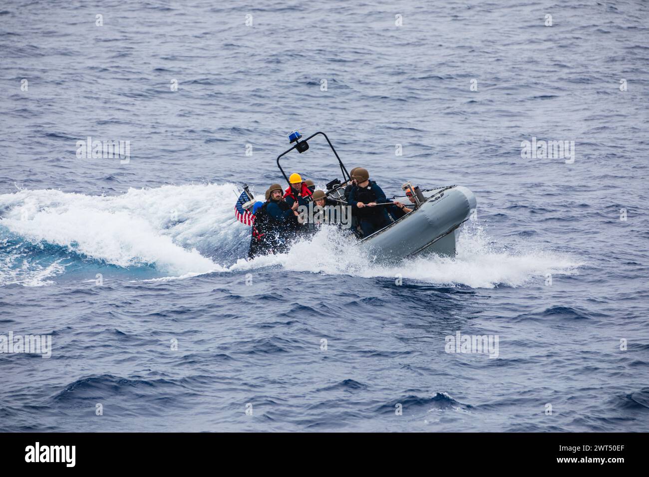 PACIFIC OCEAN (Mar. 11, 2024) Sailors conduct small boat operations on ...