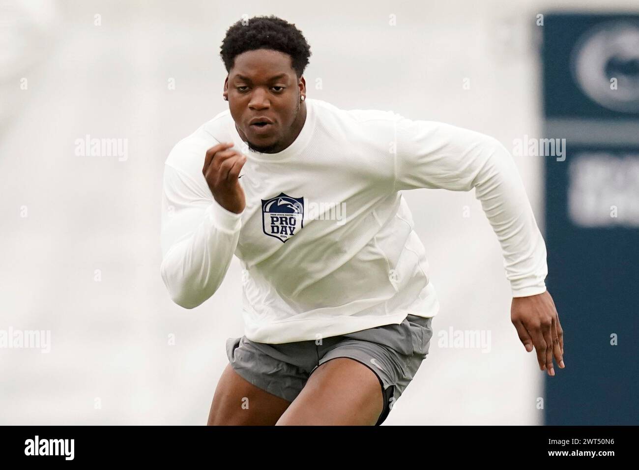 Penn State defensive end Adisa Isaac runs a drill during the NCAA ...