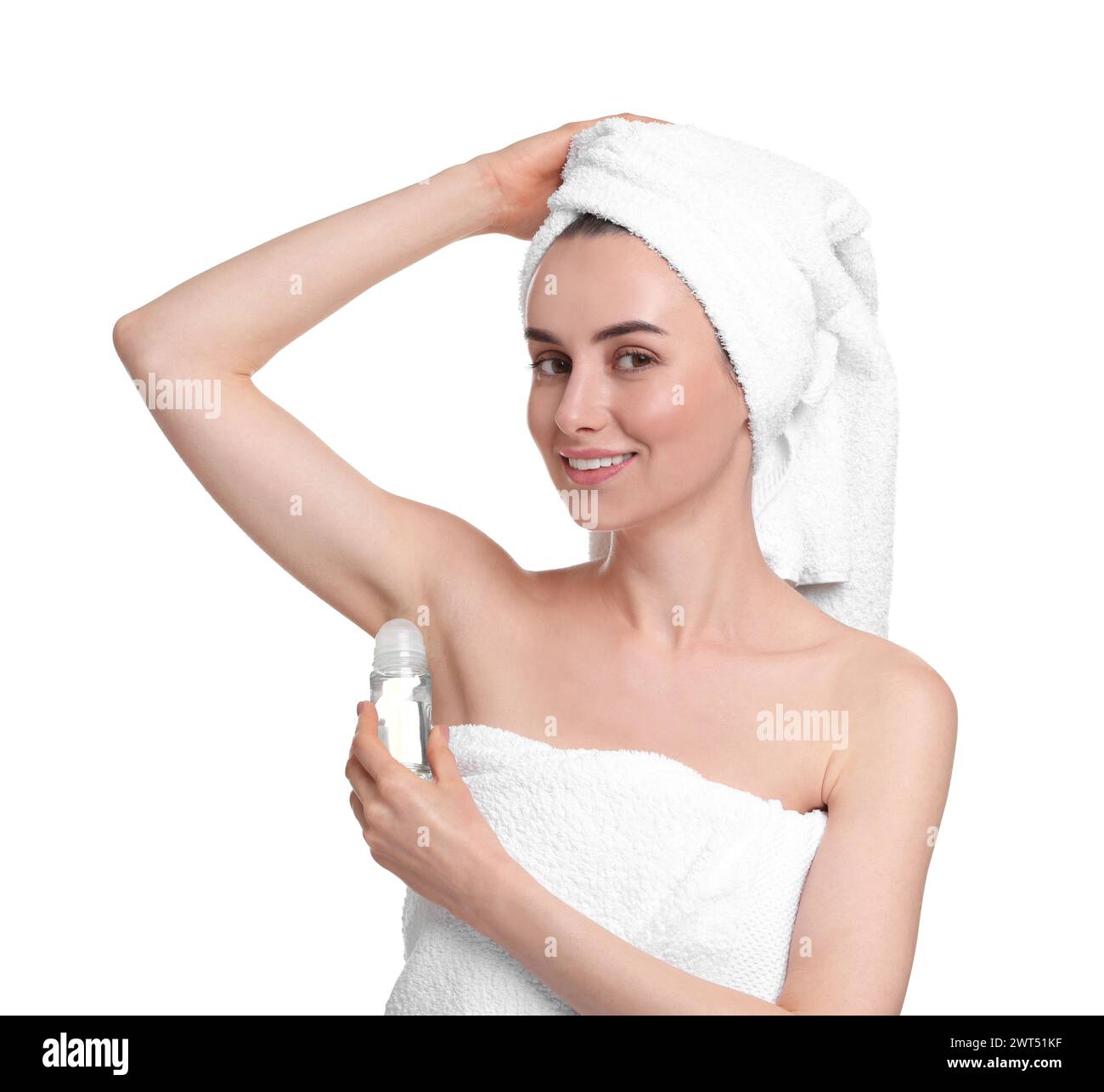 Beautiful woman applying deodorant on white background Stock Photo - Alamy