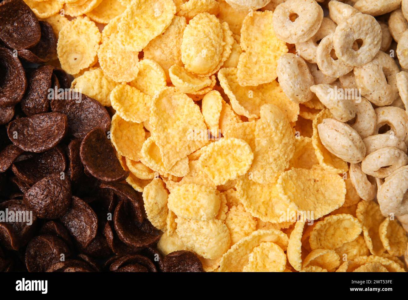Different types of breakfast cereals as background, top view Stock ...