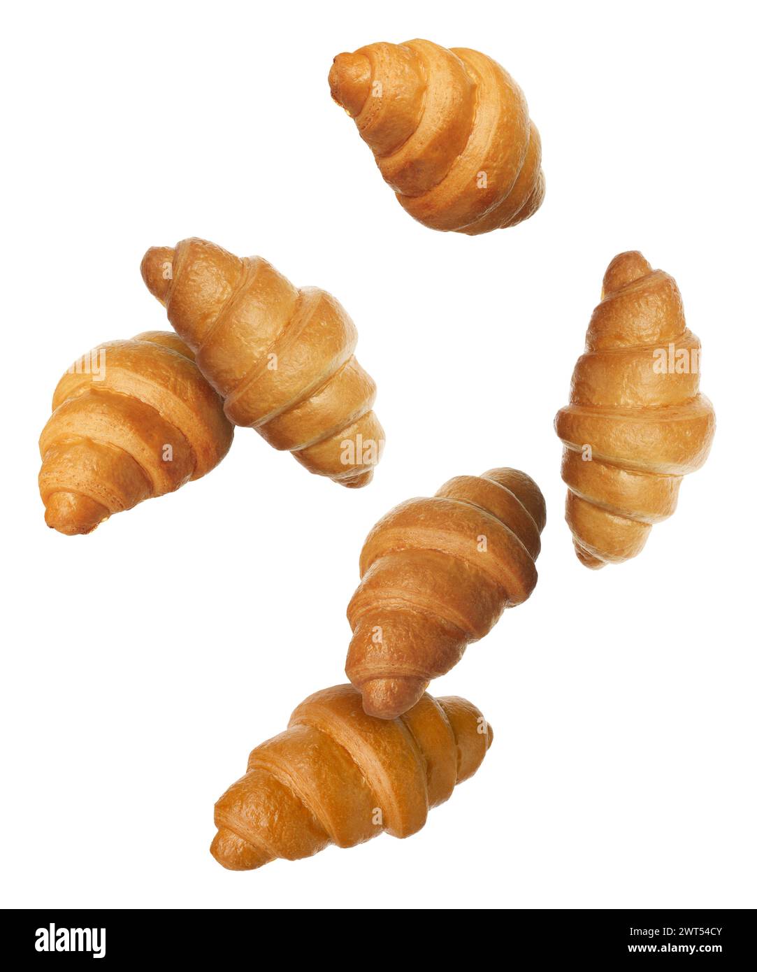 Puff pastry. Fresh croissants falling on white background Stock Photo ...