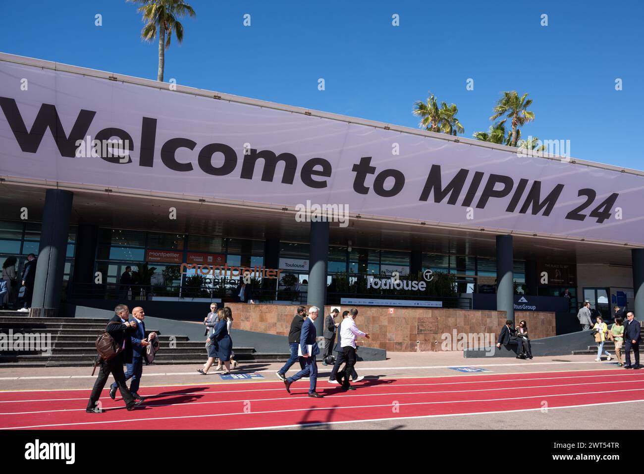 Cannes, France. 13th Mar, 2024. The banner "Welcome to Mipim 24" is seen at the entrance to ...