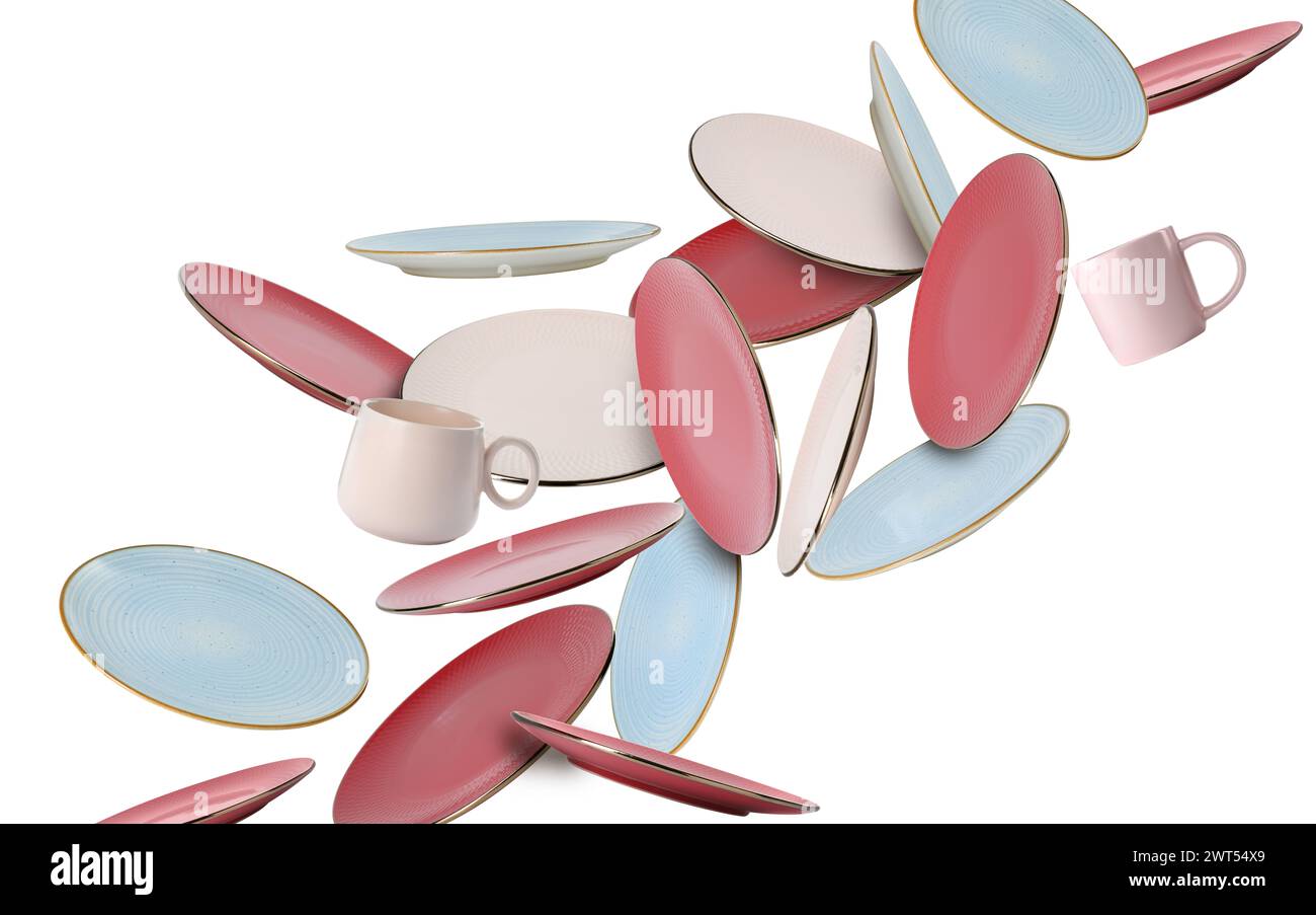 Clean plates and cups falling on white background Stock Photo - Alamy