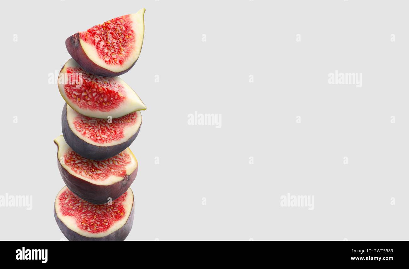 Stacked fresh figs and on grey background, space for text. Banner ...