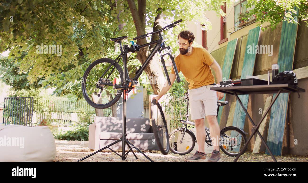 Person dismantling damaged bicycle wheel hi-res stock photography and ...
