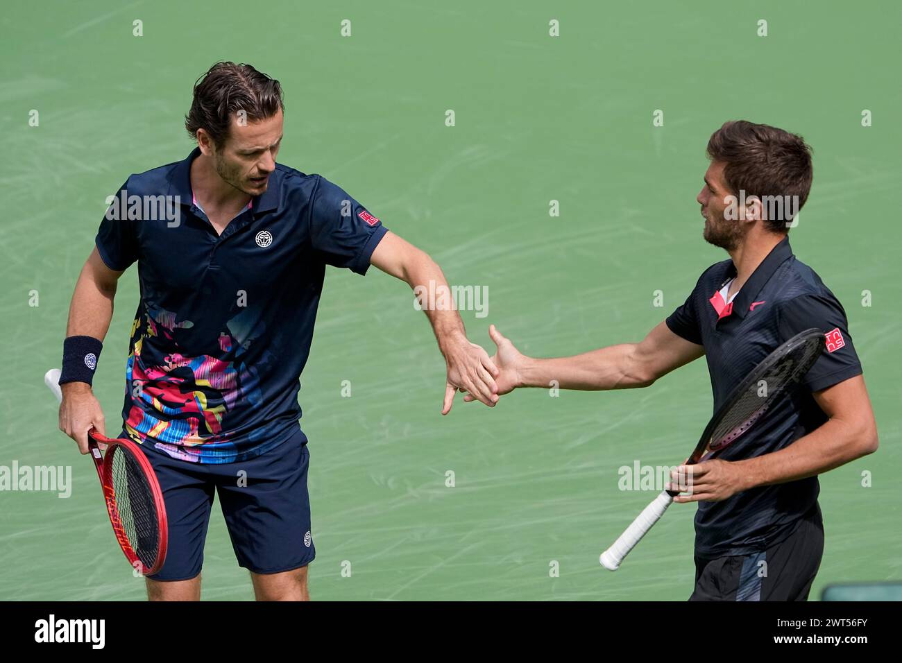 Wesley Koolhof, of the Netherlands, left, celebrates a point with ...