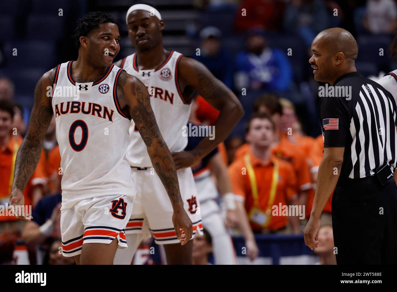 NASHVILLE, TN - MARCH 15: Auburn Tigers guard K.D. Johnson (0) shares a ...