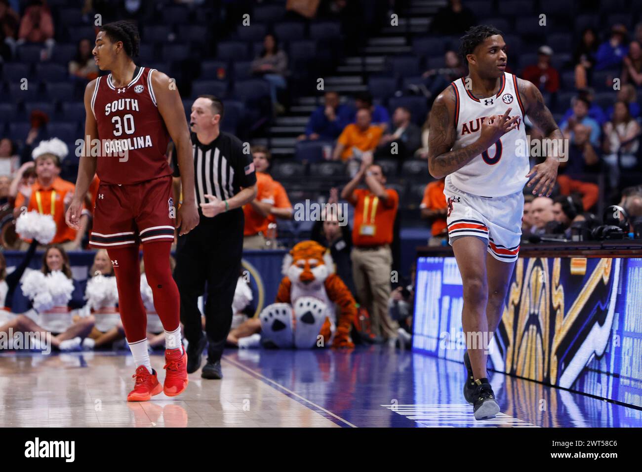 NASHVILLE, TN - MARCH 15: Auburn Tigers guard K.D. Johnson (0) holds up three fingers to the ...