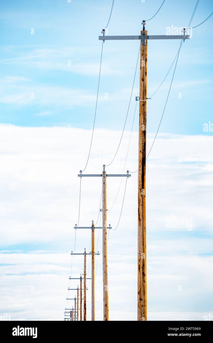 Line wooden poles hi-res stock photography and images - Alamy
