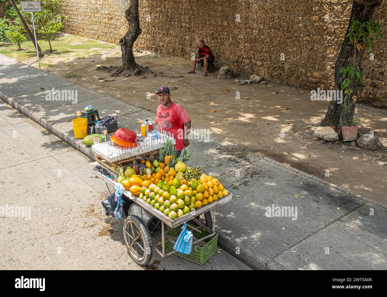 Cartagena, Colombia - July 25, 2023: Ambulant fruit and drink vendor ...