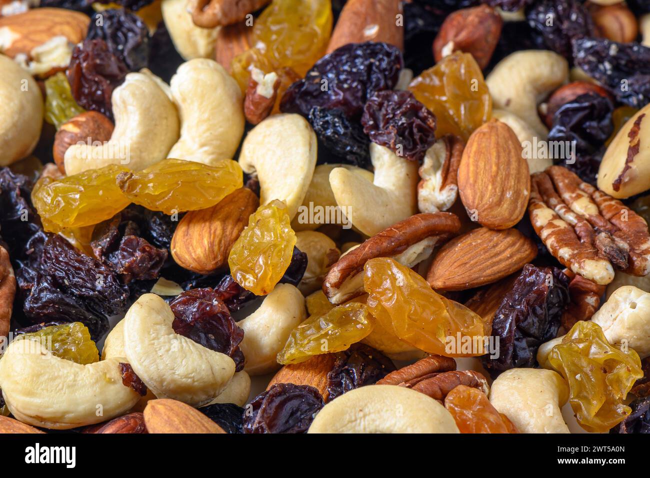 mixture of nuts and dried fruits complemented by vitamins and trace ...