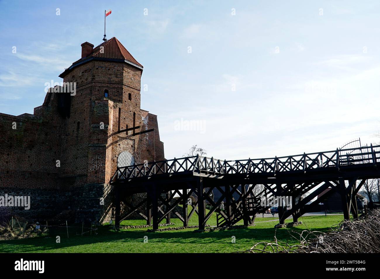 Liw, Poland - March 10th, 2024 - Gothic medieval castle and wooden ...