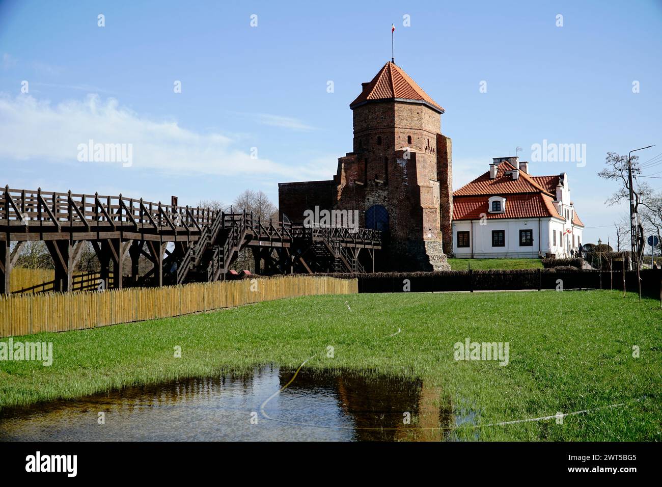 Liw, Poland - March 10th, 2024 - Gothic medieval castle and wooden ...