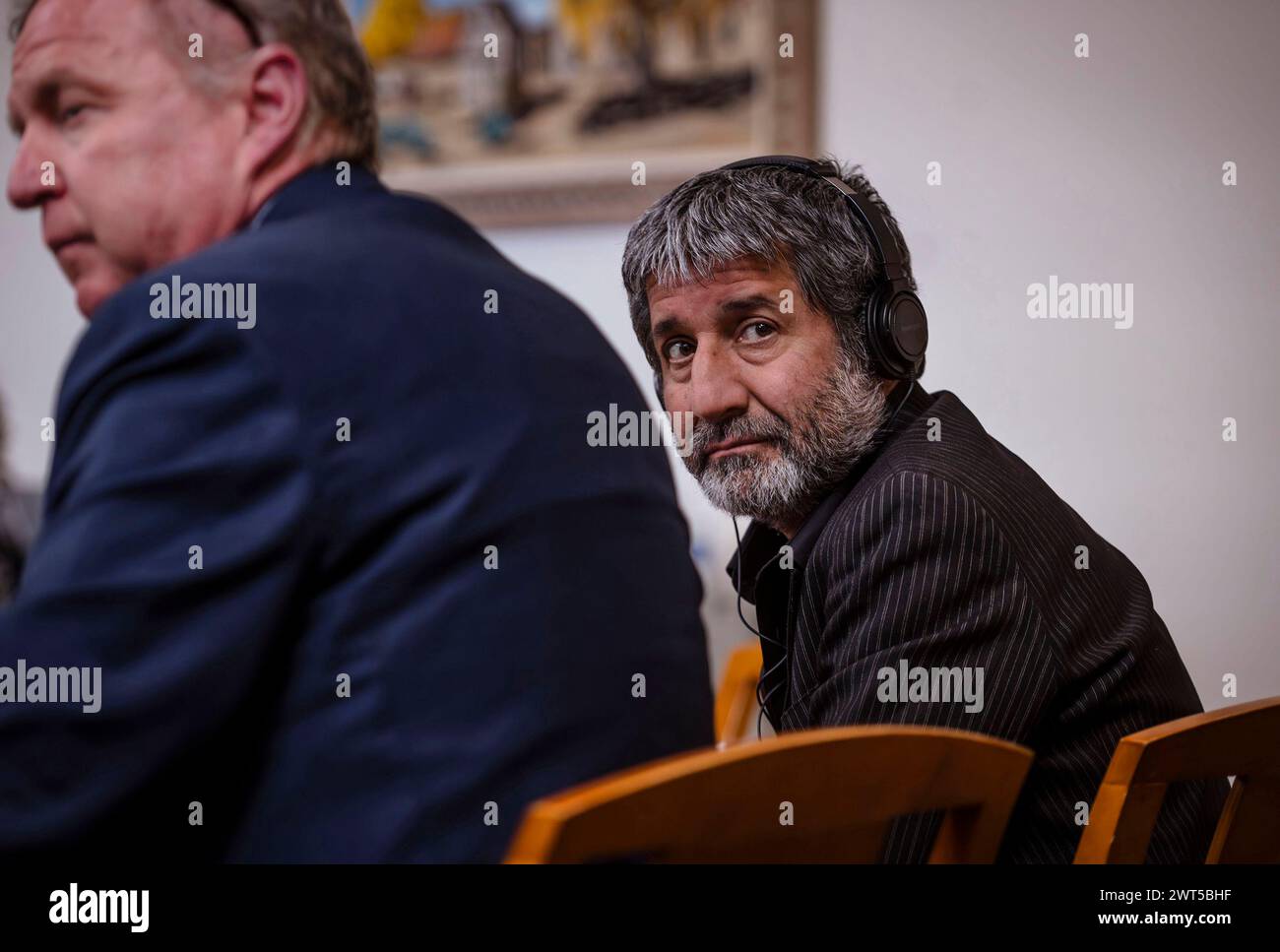 Muhammad Syed sits next to his defense attorney Thomas Clark, left ...