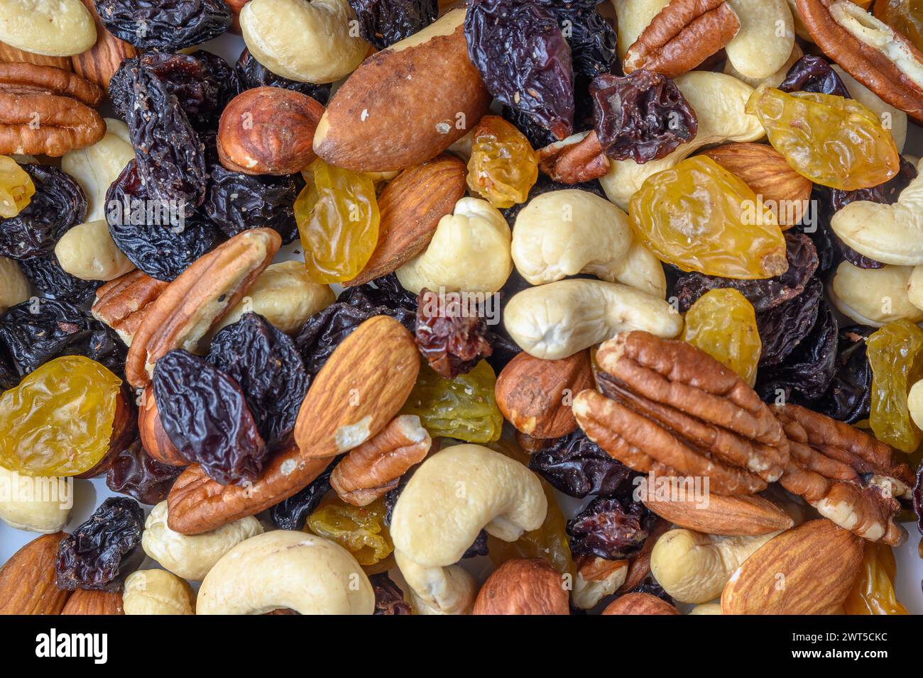 mixture of nuts and dried fruits complemented by vitamins and trace ...
